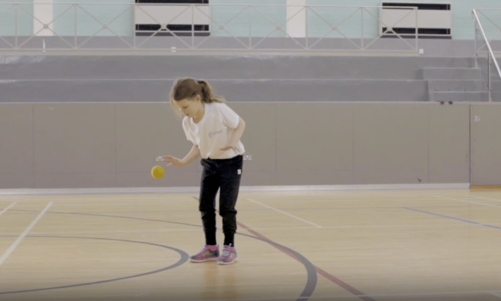 One Handed Bounce - Watch Instructional Video | The PE Hub